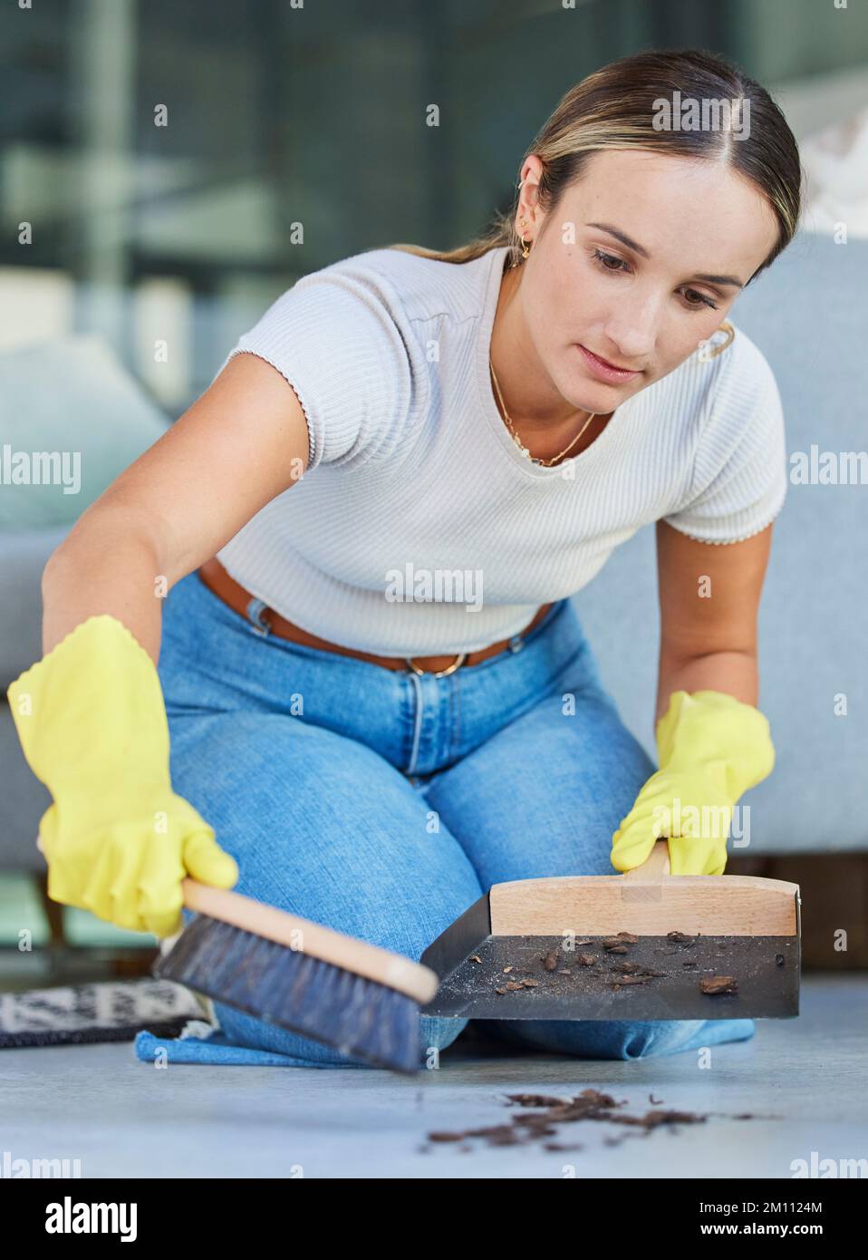 Cleaning, dust and sweeping with woman on floor of living room for ...