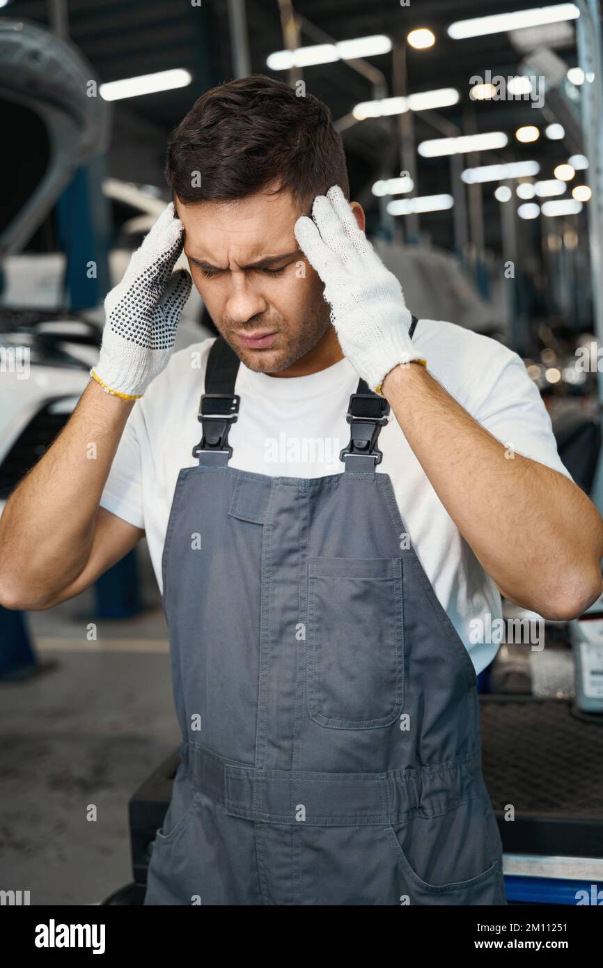 Tired car mechanic hi-res stock photography and images - Alamy