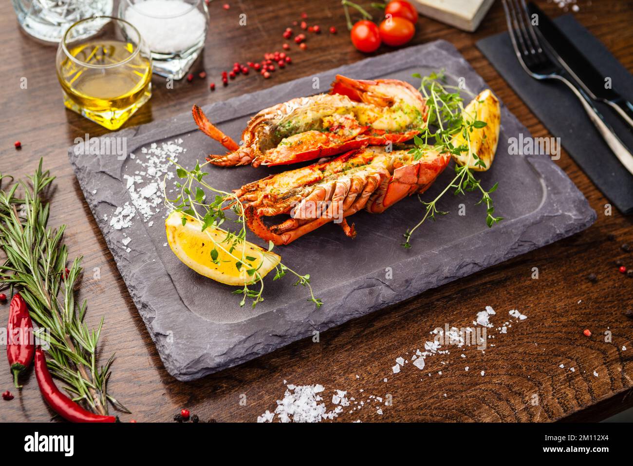 Lobster with flavored butter. Herb butter, lemon. Delicious healthy ...