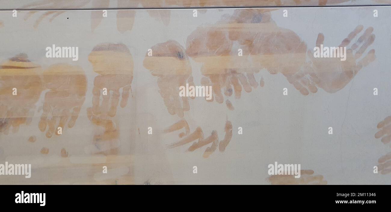 handprints on a dusty table Stock Photo - Alamy
