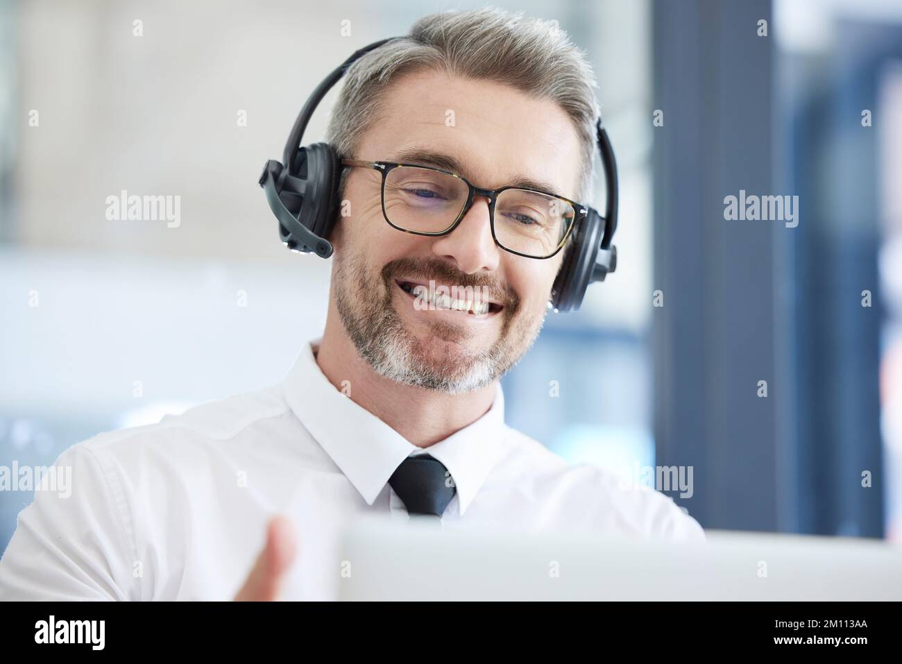 Call center, customer support and senior man talking to client in ...