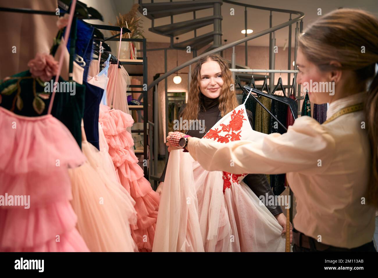 Stylist client woman fashion dress designer hi-res stock photography ...