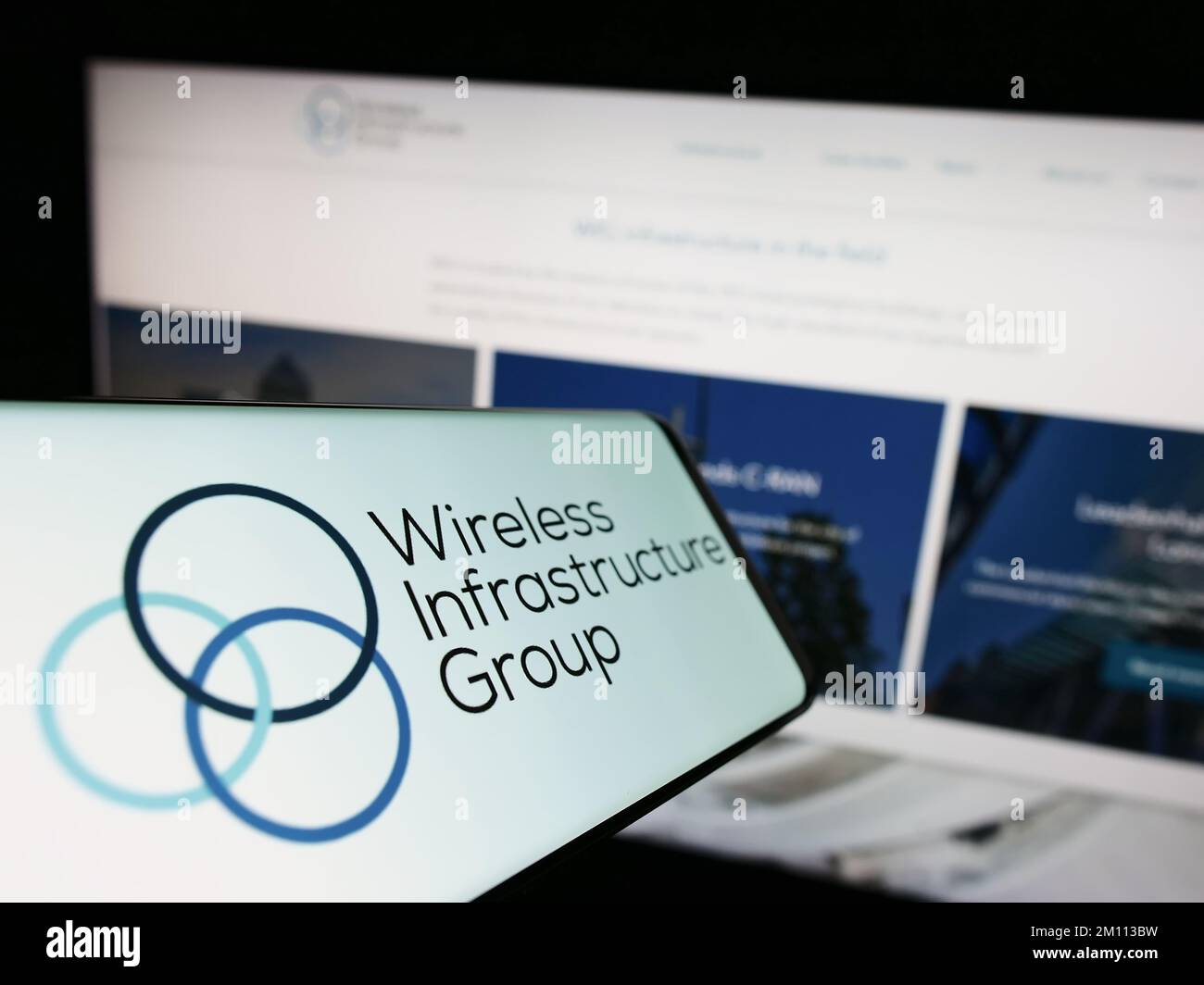 Mobile phone with logo of company Wireless Infrastructure Group (WIG ...