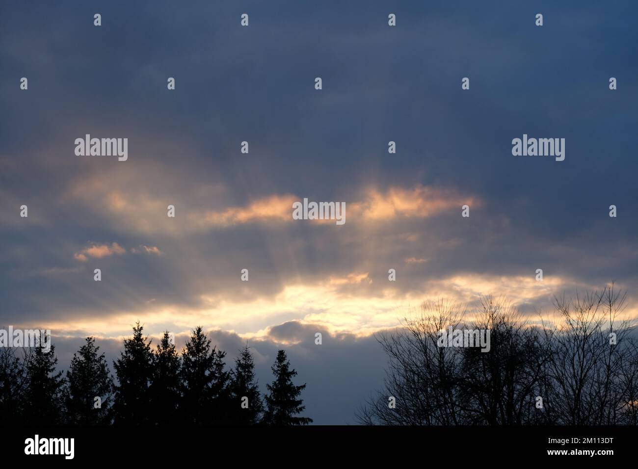 The sun coming out from behind the clouds - the concept of God's ...