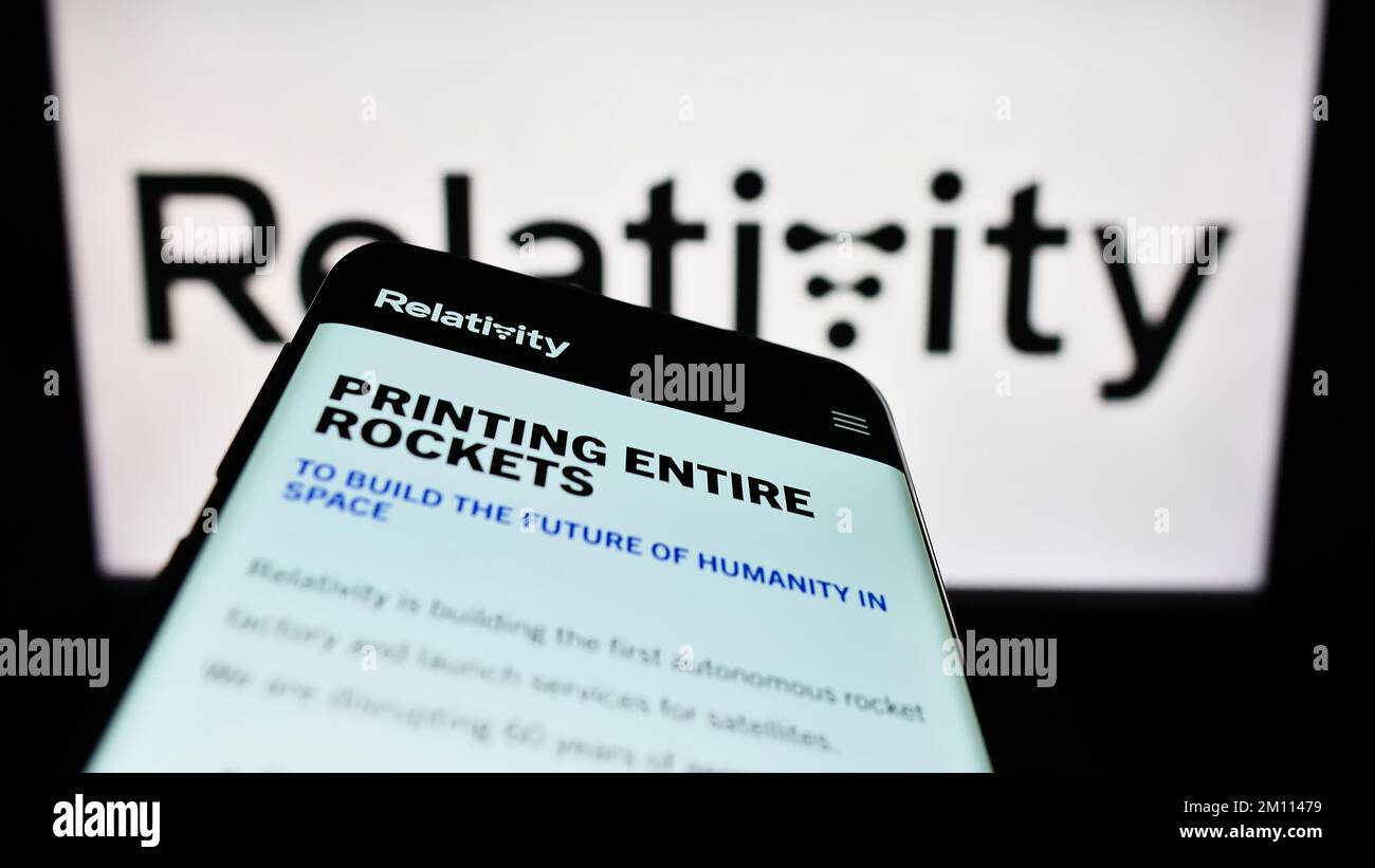 Mobile phone with website of US aerospace company Relativity Space Inc. on screen in front of ...