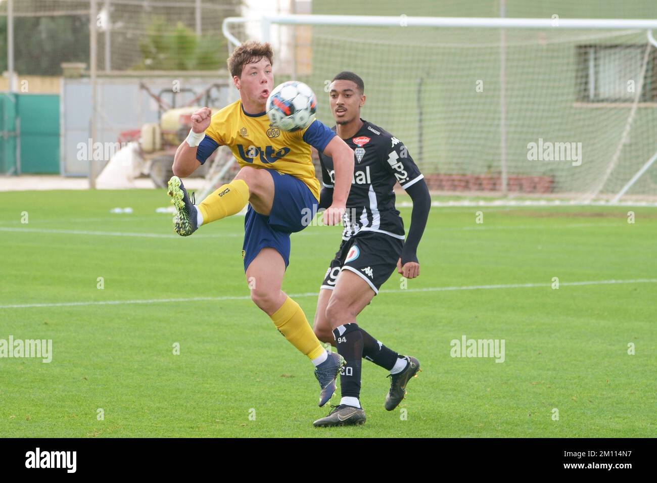 Union's Arnaud Dony and Angers' Yan Valery pictured during a football ...