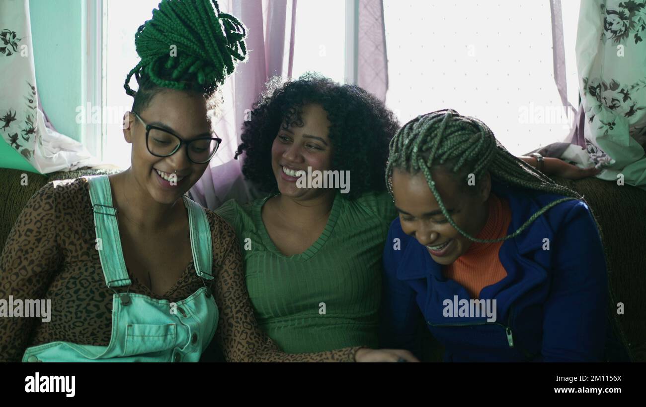 Young Brazilian South American girlfriends laughing together Stock ...