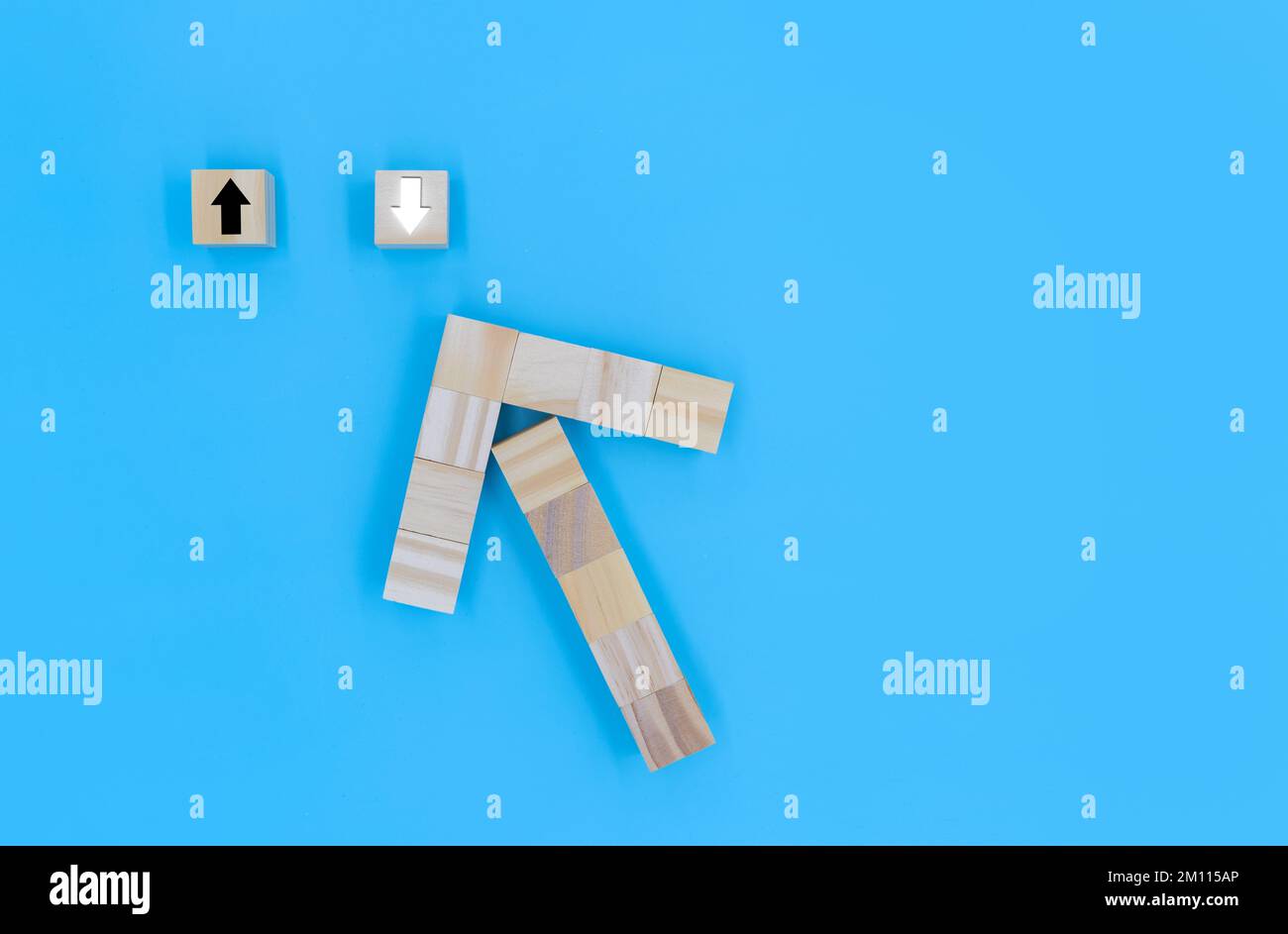 Woodblock arrows to select a drop Stock Photo - Alamy