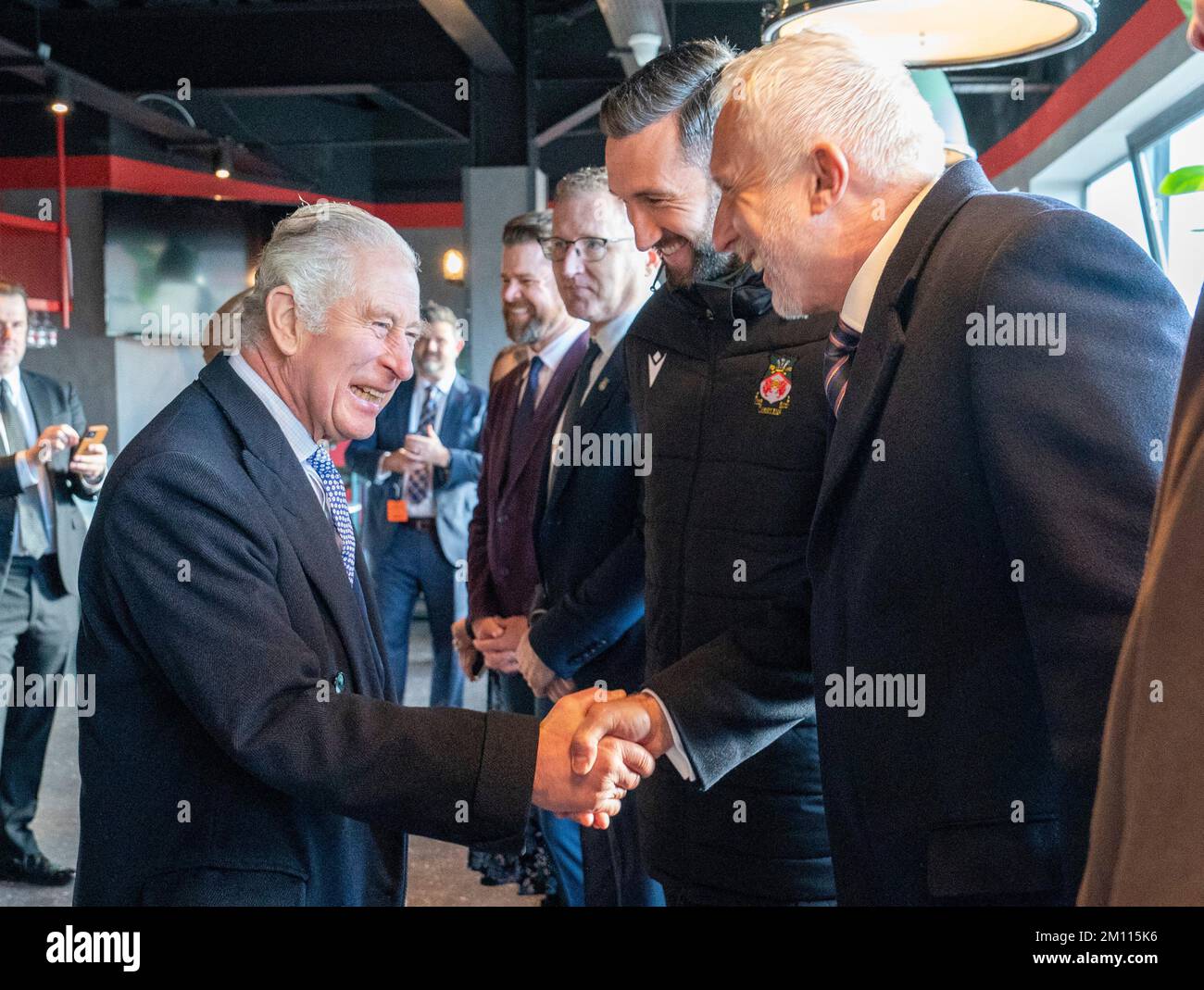 King Charles III (left) speaks to speaks to one his former protection ...