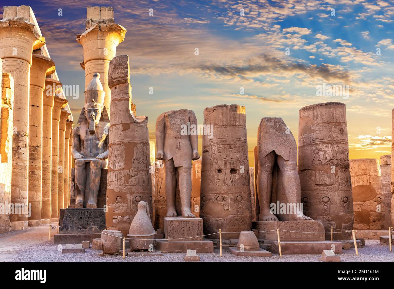 Courtyard of the Luxor Temple and the statues of Ramses II, Egypt Stock ...