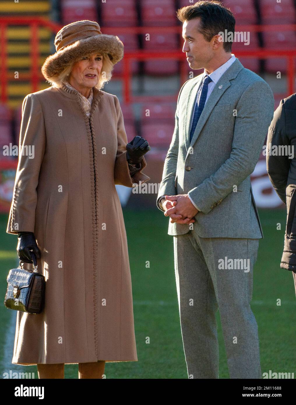 The Queen Consort speaks to Rob McElhenney during a visit to Wrexham ...