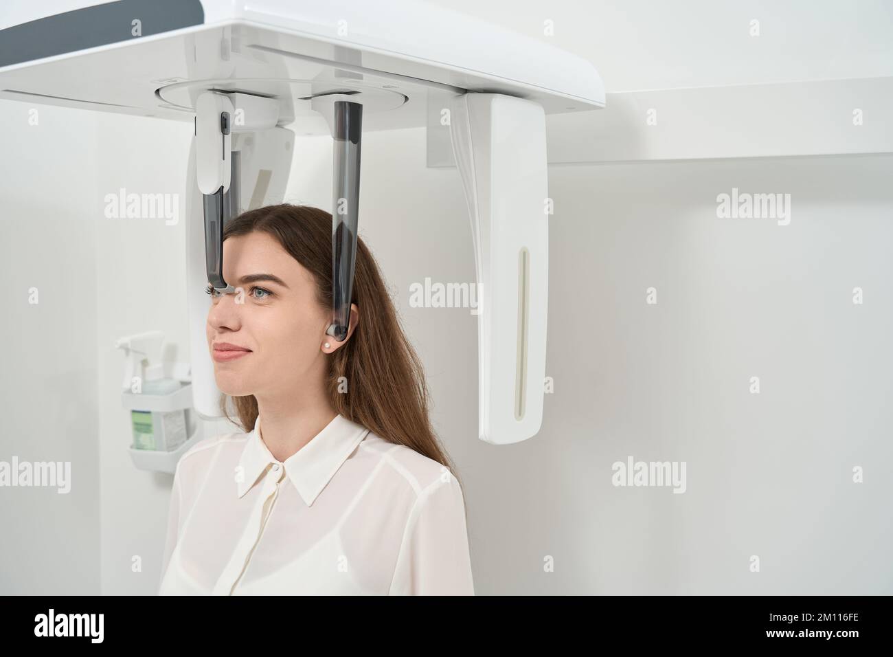 Dental clinic client during CT scanning procedure Stock Photo - Alamy