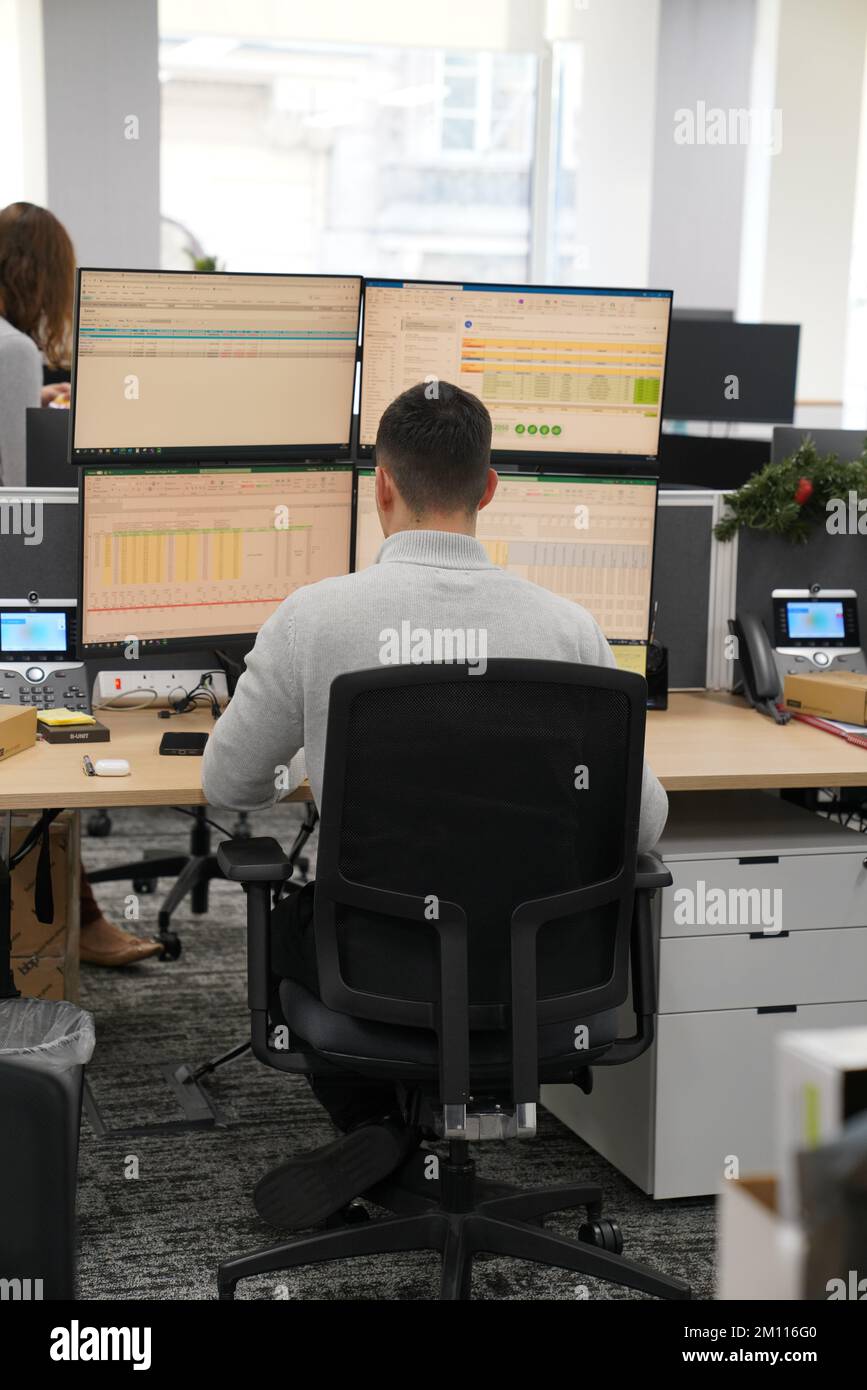 Person working computer screens hi-res stock photography and images - Alamy