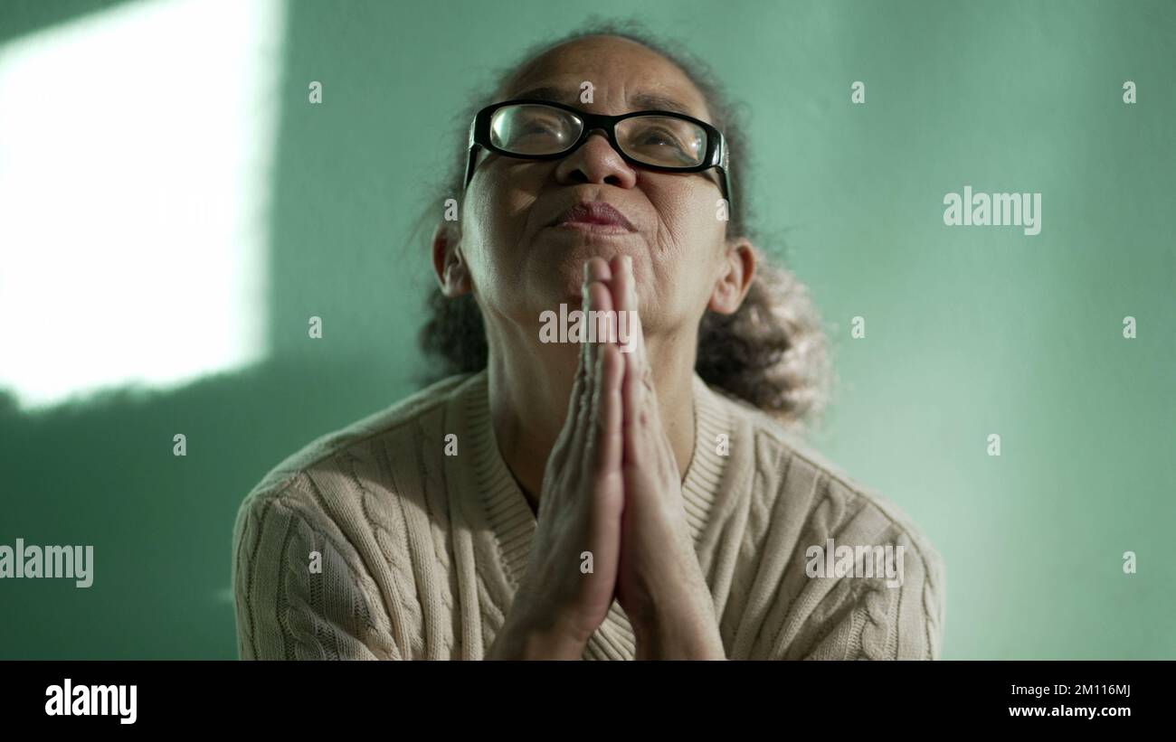 Faithful south american hispanic older hi-res stock photography and ...