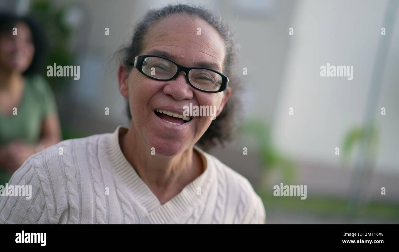 One happy senior woman laughing and smiling. South American hispanic ...