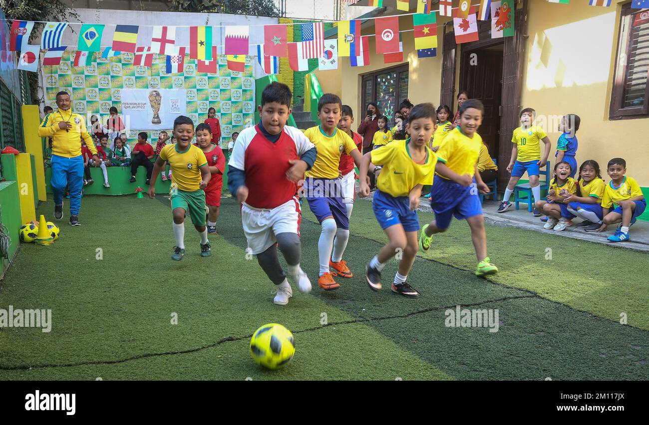 Kathmandu, Bagmati, Nepal. 9th Dec, 2022. Children play football at a ...
