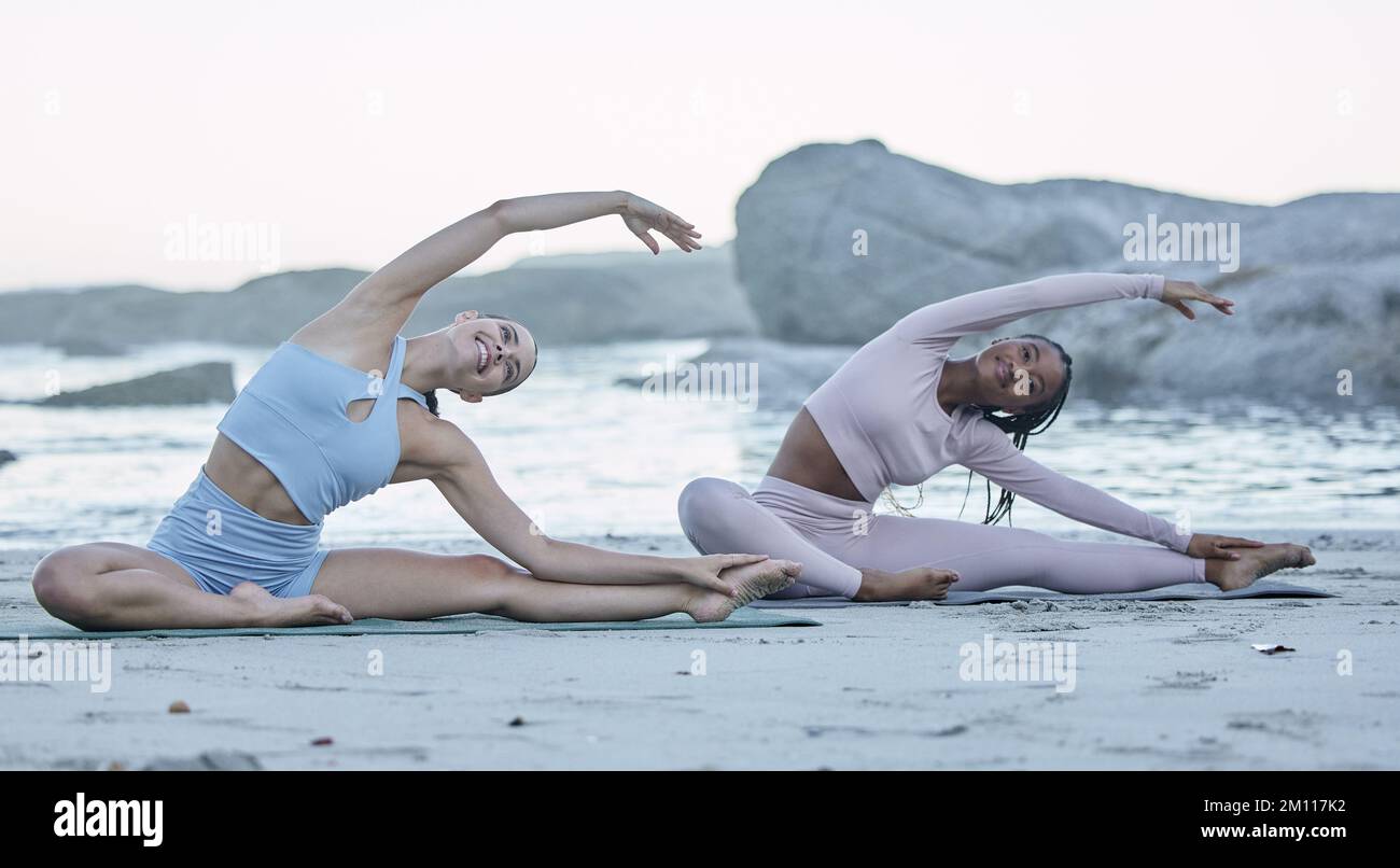 Beach, yoga and stretching women or team with fitness, exercise and ...