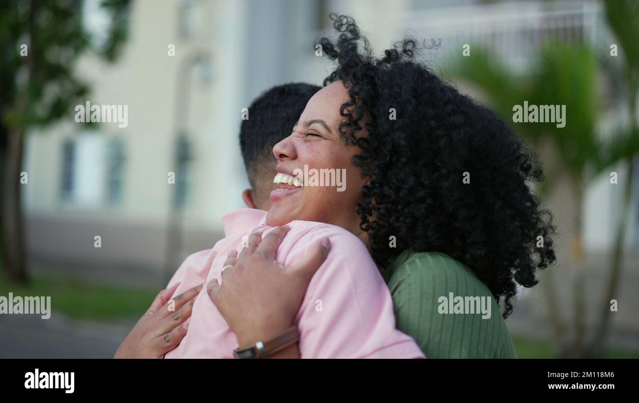 Happy people embrace. Real life authentic family hug. Ecstatic young ...