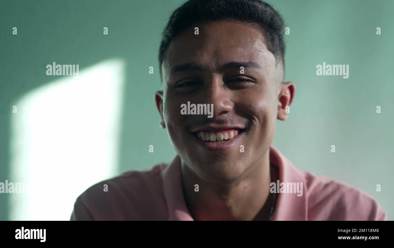 Happy South American man smiling portrait face closeup. A confident ...