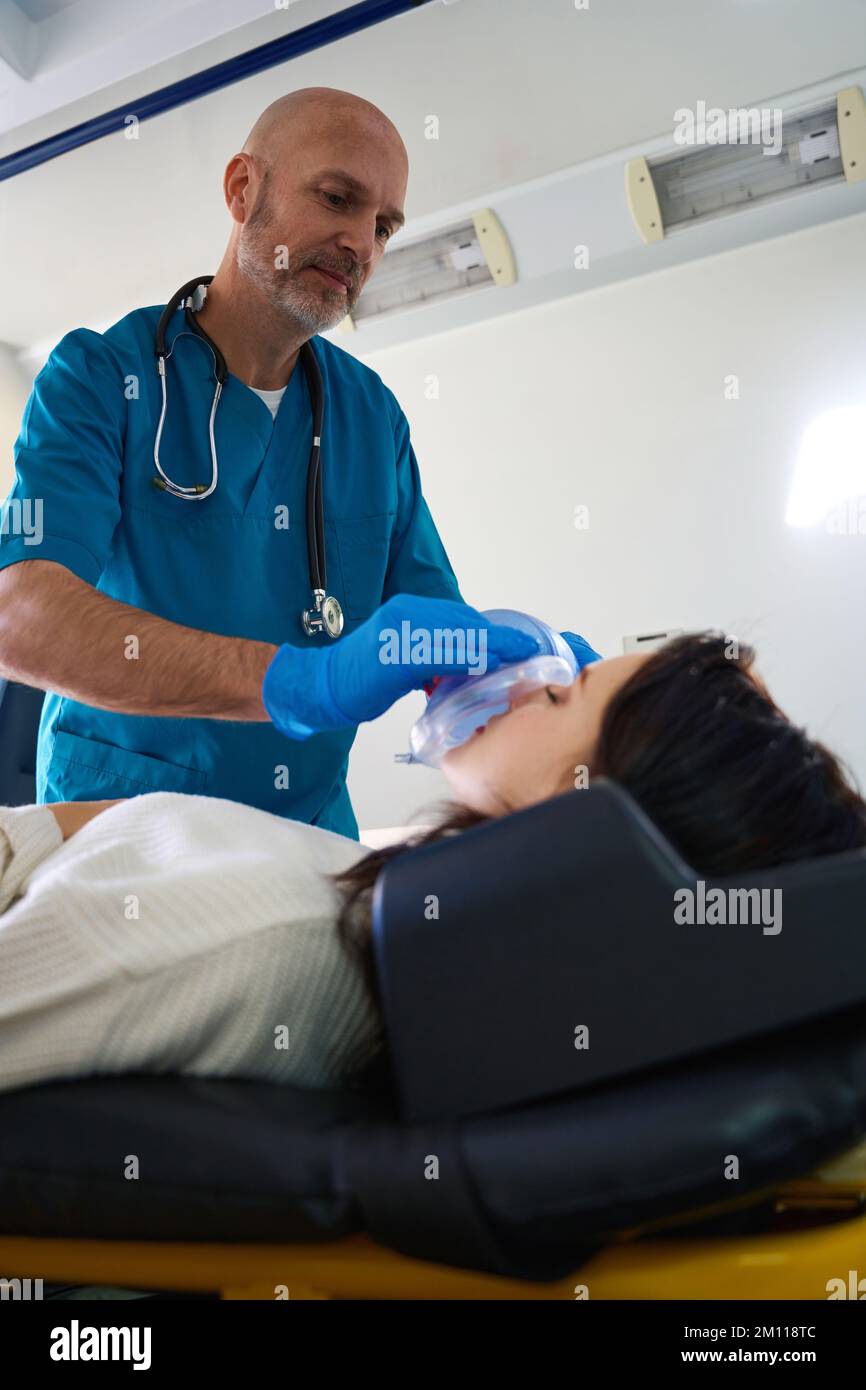 Ambulance and patient with stroke hi-res stock photography and images ...