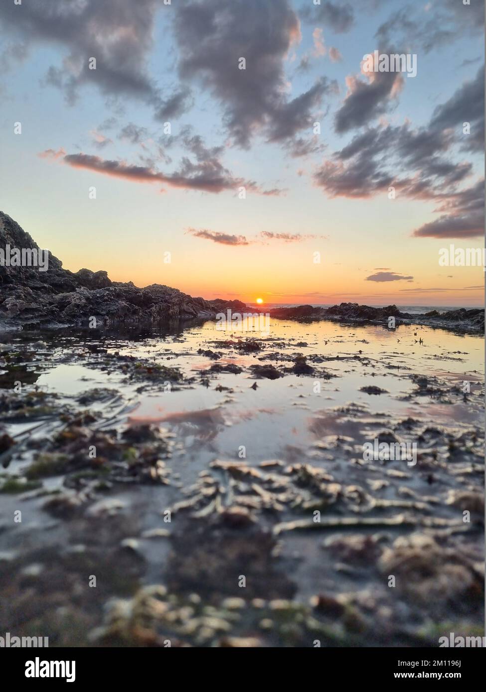 A mix of color in a Sicily sunset Stock Photo - Alamy