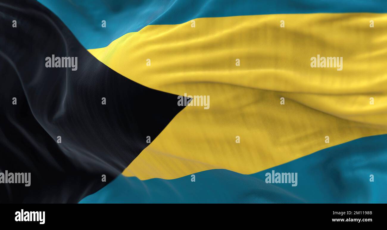 Close-up view of the Bahamas national flag waving in the wind. The ...