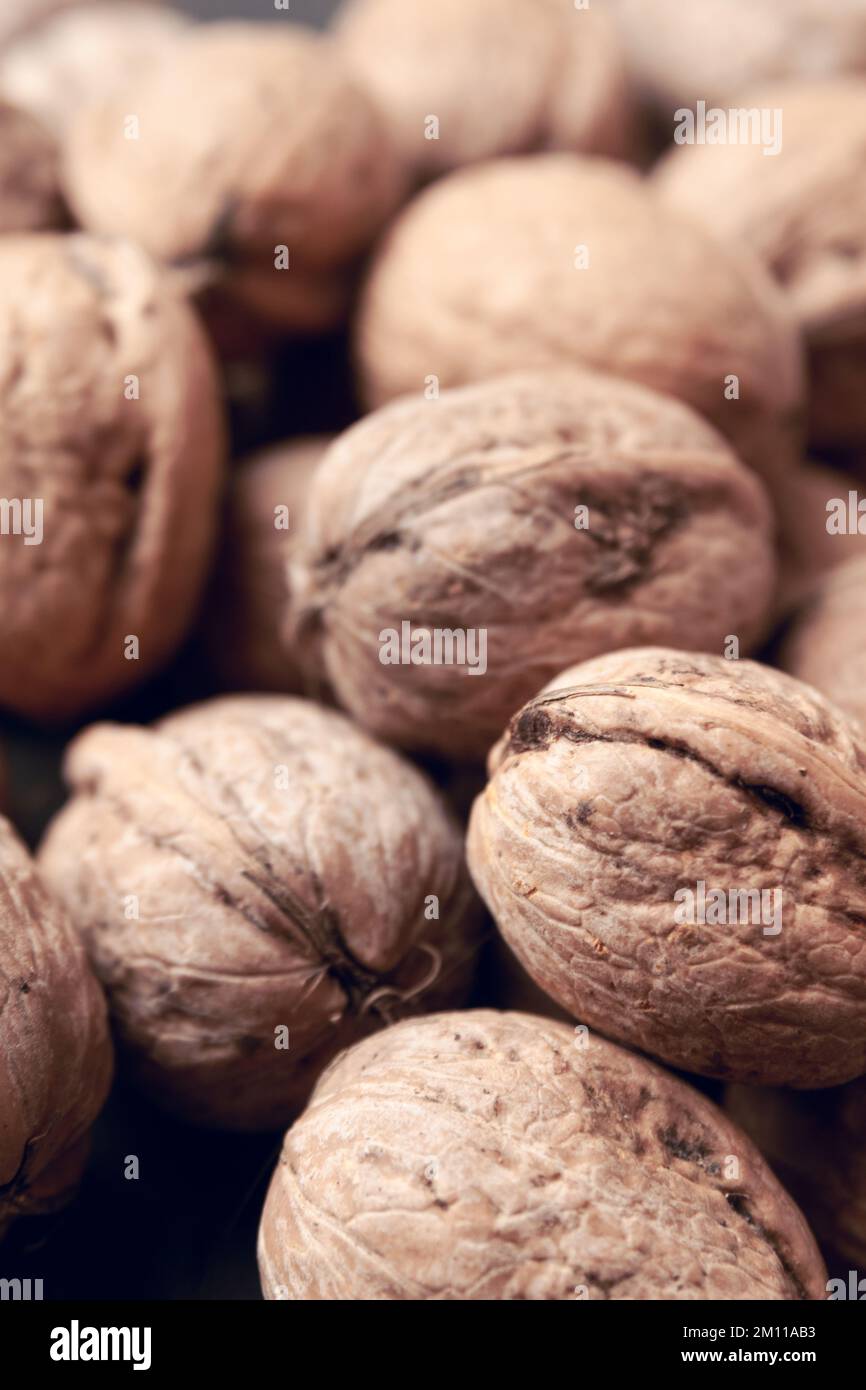 Walnuts with and without shells as background Stock Photo - Alamy