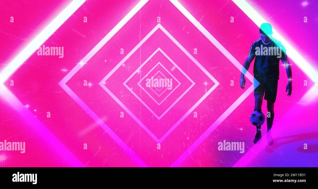 Caucasian young athlete playing soccer with neon design over pink ...