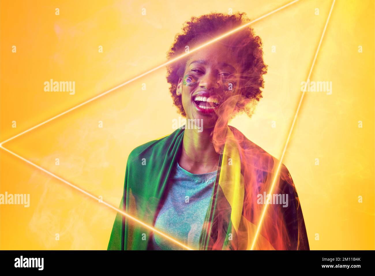 Triangle neon over happy african american female fan with flag during ...