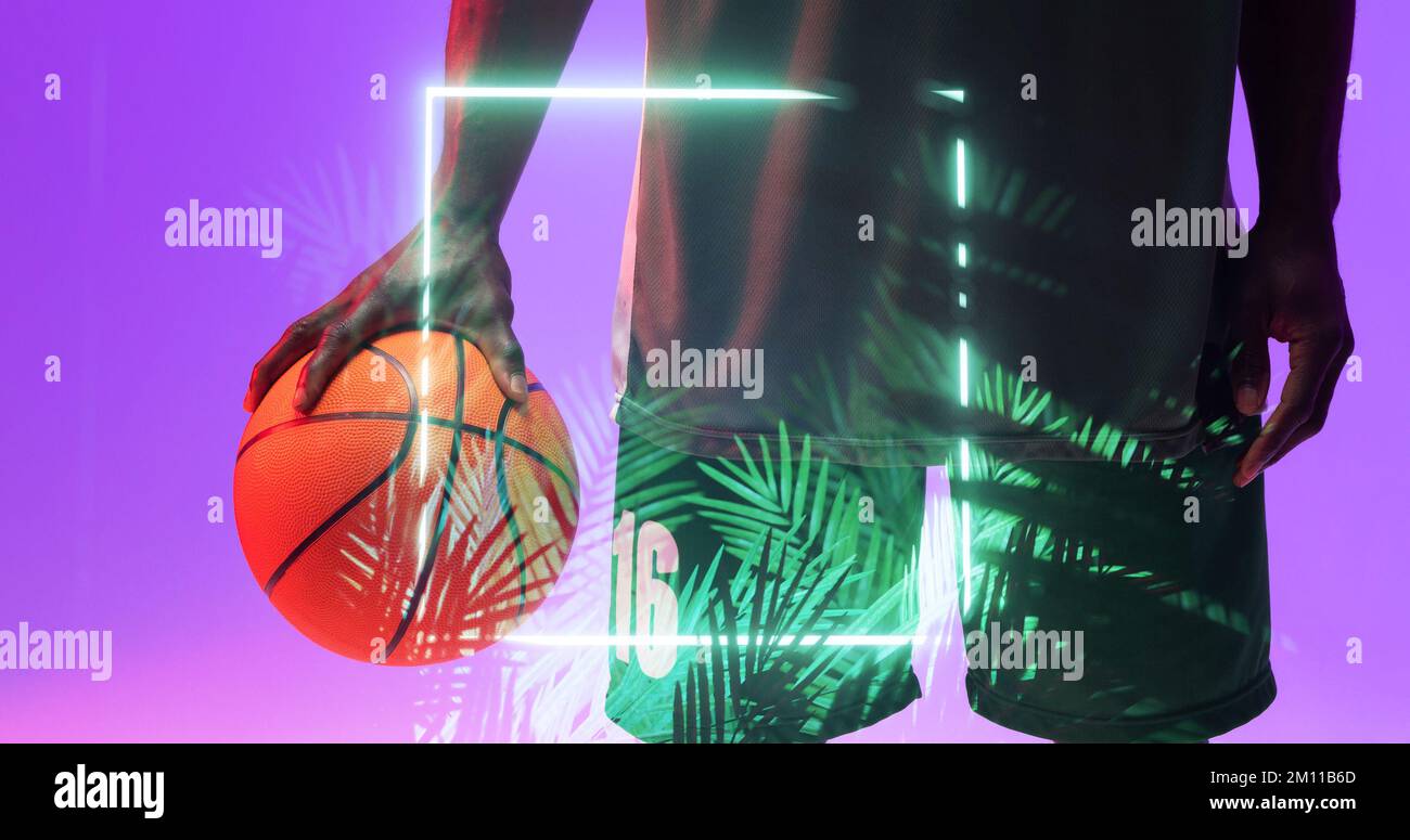 Multiple exposure of african american basketball player and plants with ...