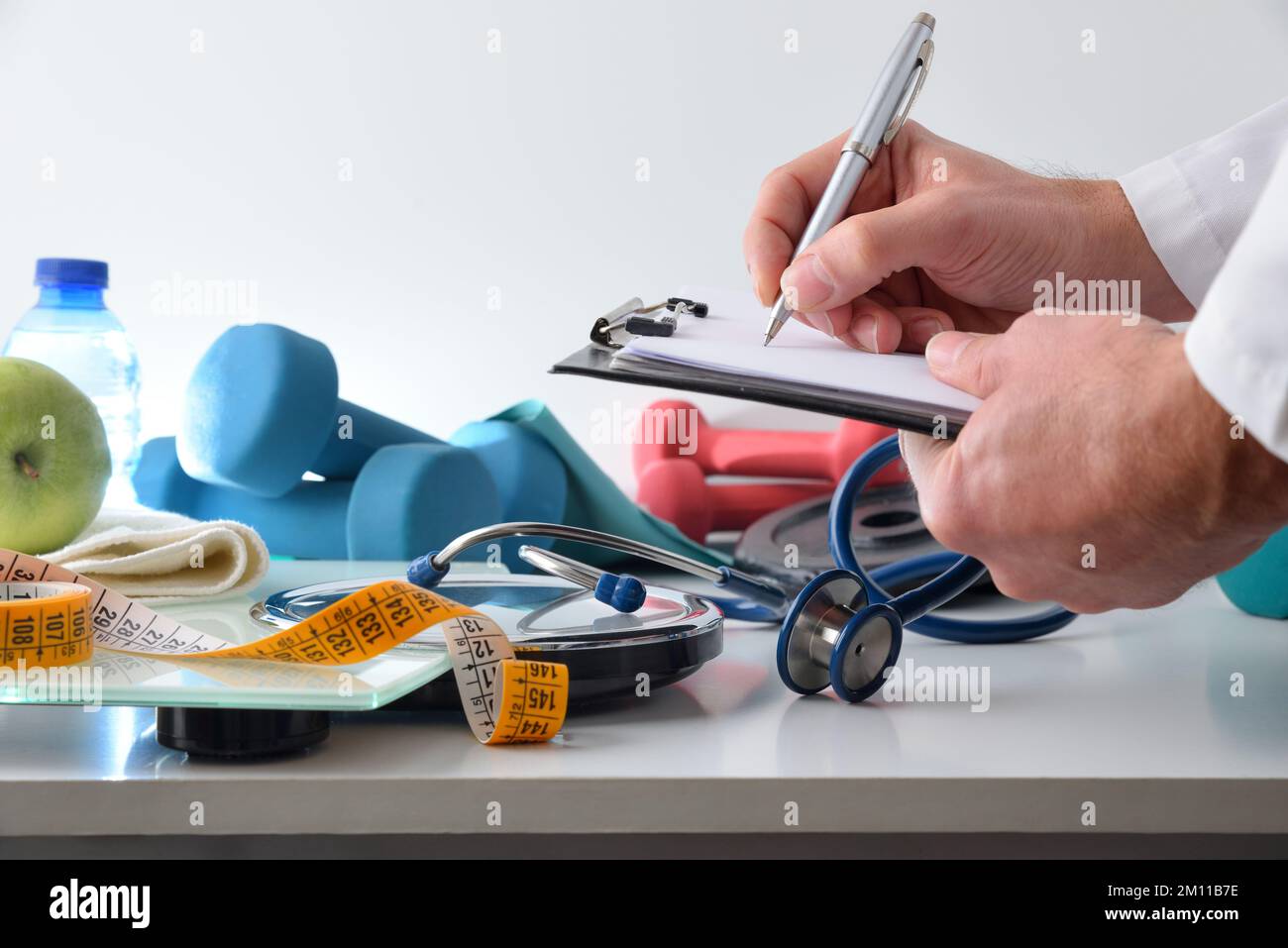 Sports technical doctor taking notes with measuring and sport ...