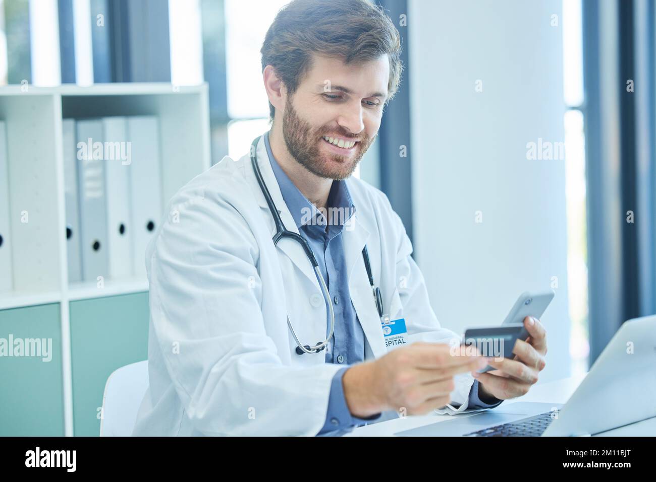 Doctor, phone and credit card for online shopping, ecommerce and making ...