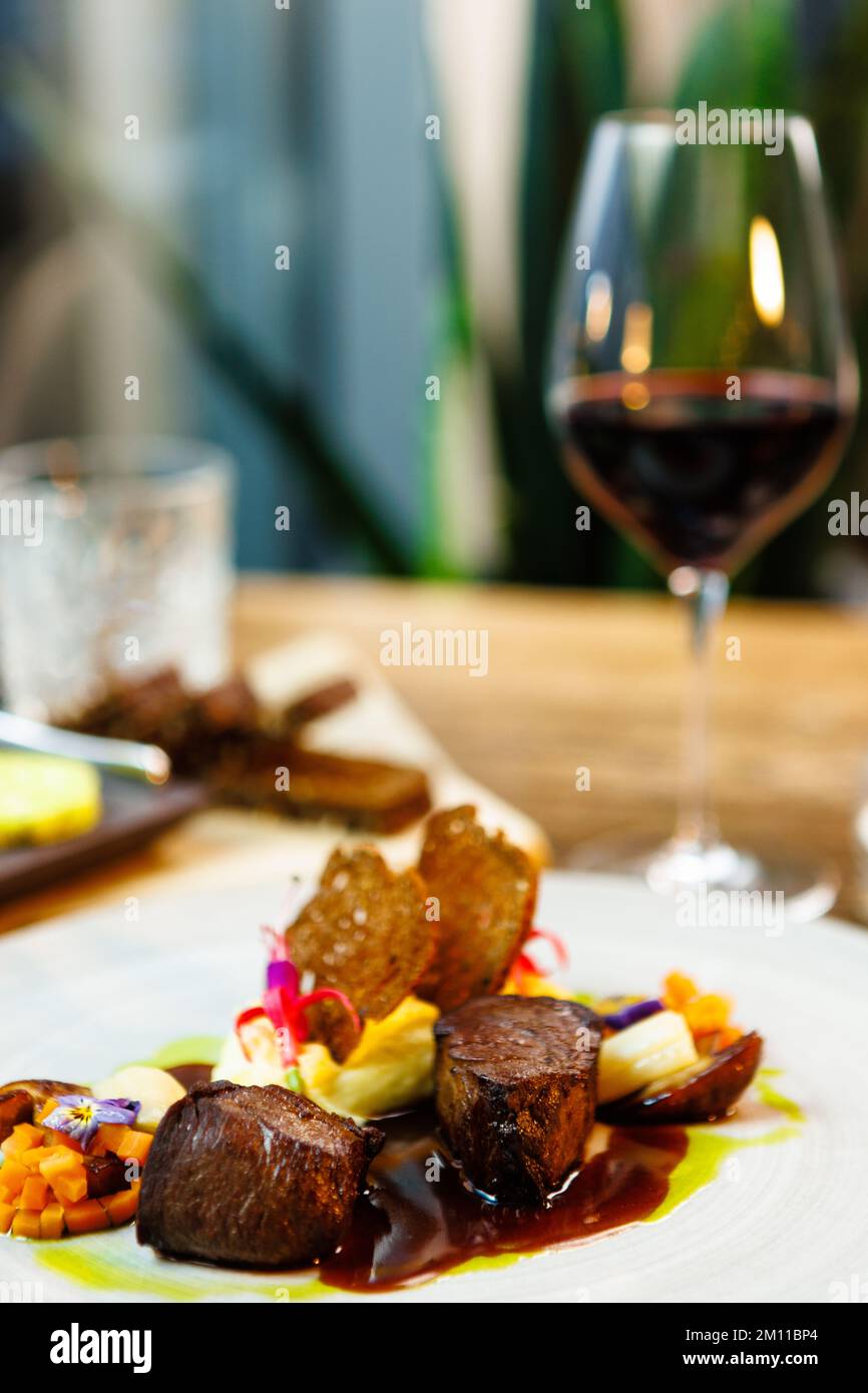 Deer tenderloin. Truffle-potato puree, porcini mushrooms, baked leek ...