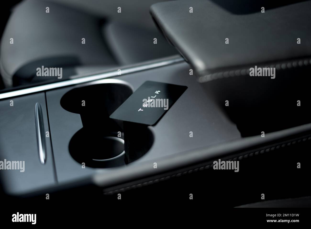 black key card with the inscription tesla from an electric car. russia ...