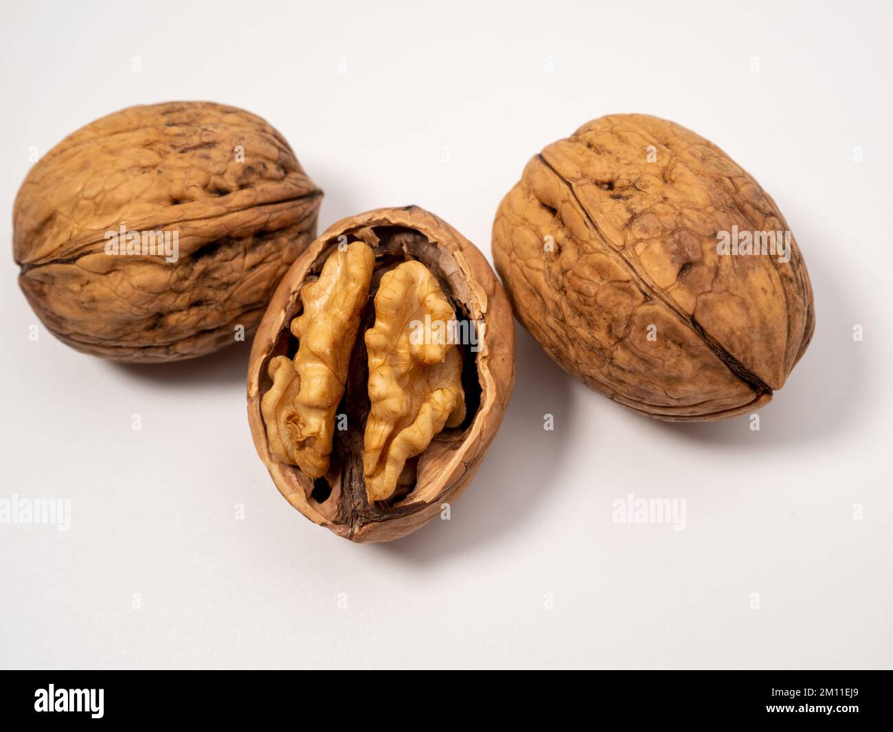 Walnut on a white background. Raw walnut. Close-up Stock Photo - Alamy
