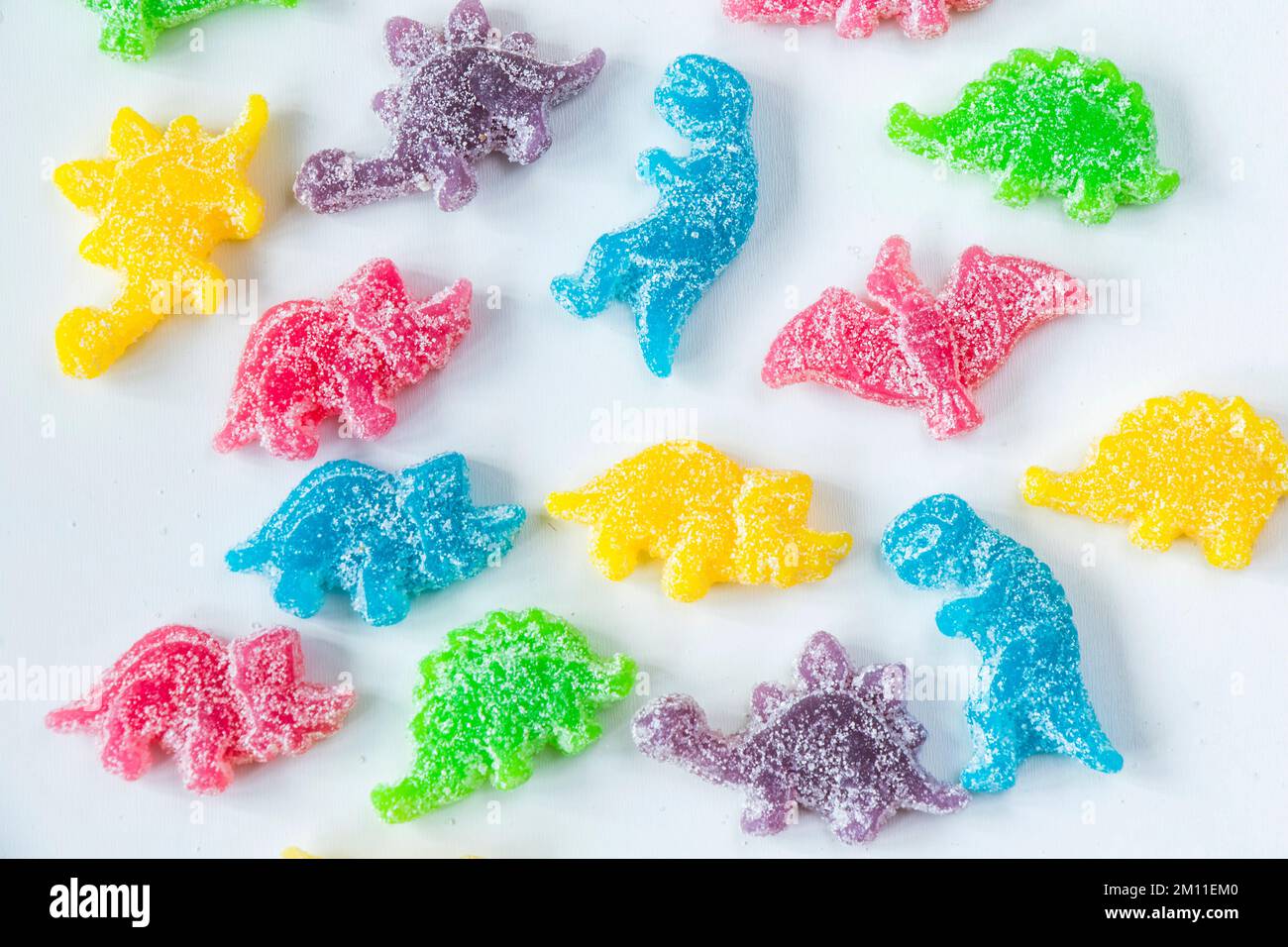 Dinosaurs jelly bonn, candies on the white background, colorful jelly ...