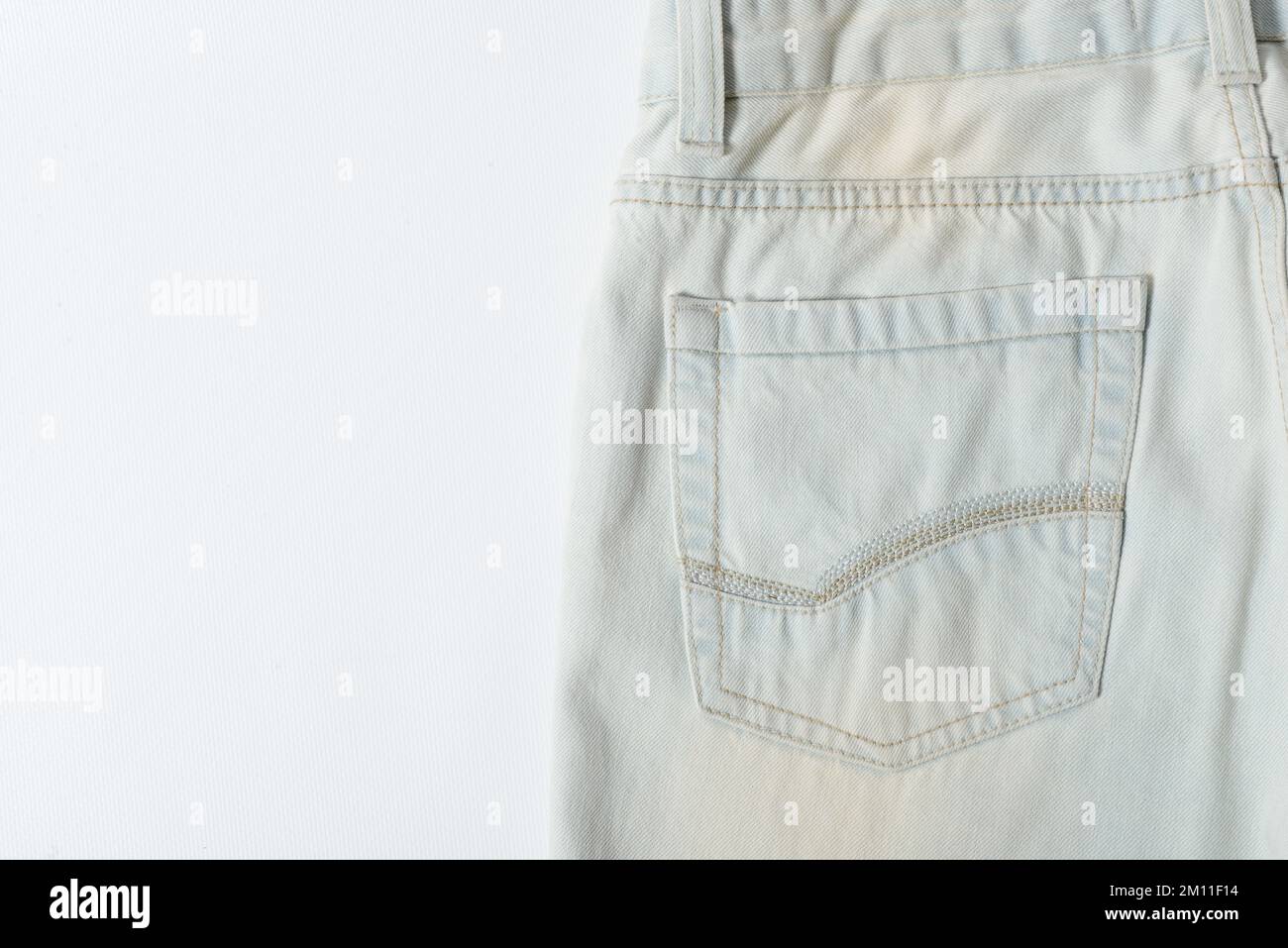 Close up shot back pocket of a ice blue jeans Stock Photo - Alamy