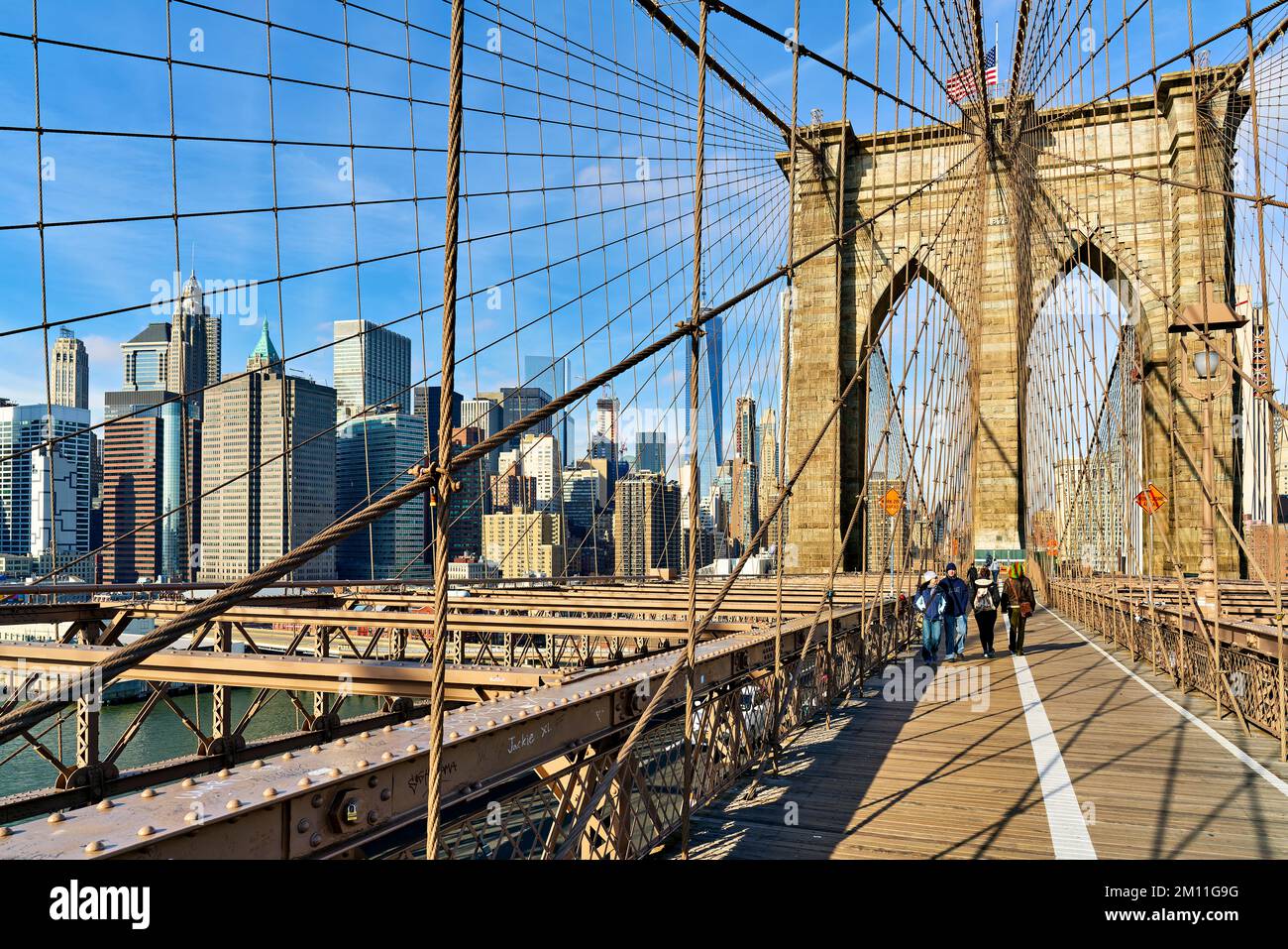New York. Manhattan. United States. Crossing Brooklyn Bridge on foot ...