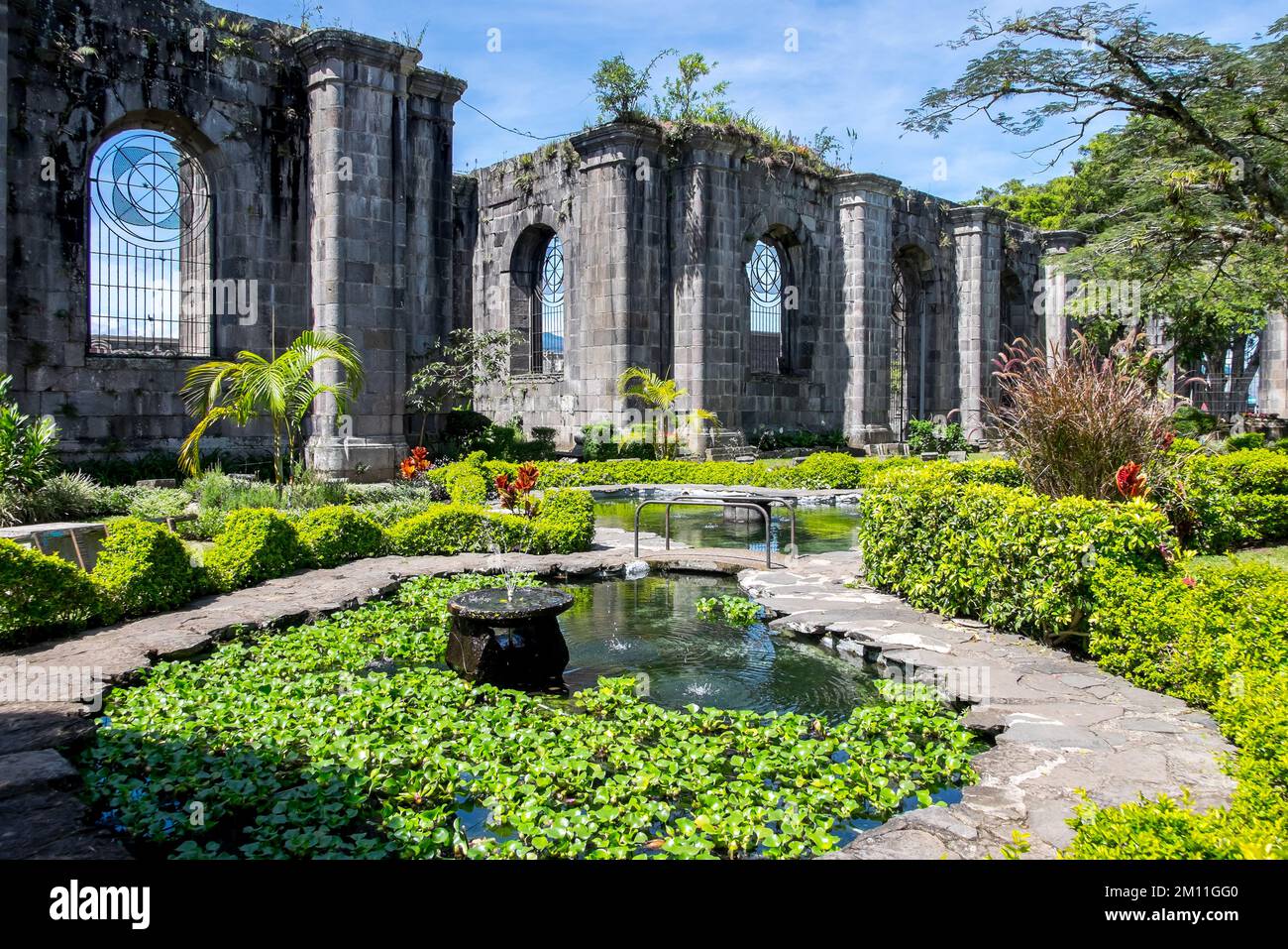 Gardens inside the ruins of the old Romanesque church of Cartago in ...