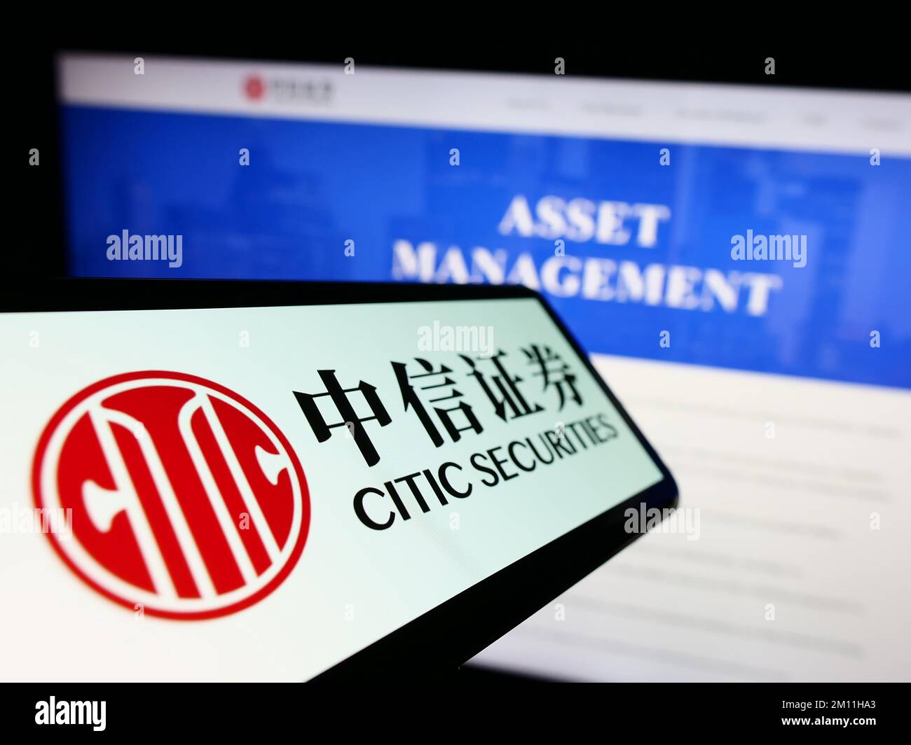 Cellphone with logo of Chinese company CITIC Securities Co. Ltd. on ...