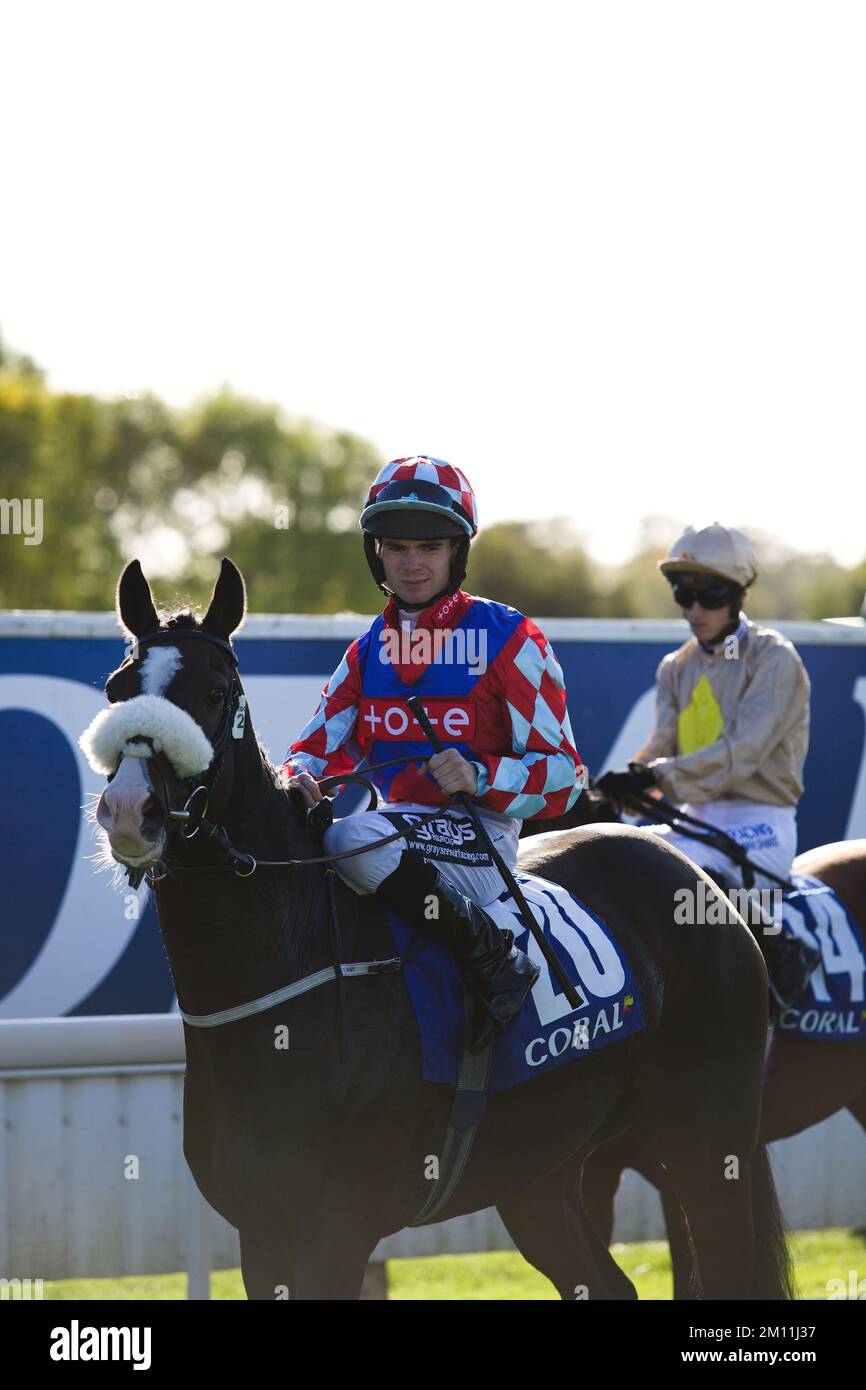 Jockey Billy Garritty on Strike Red at York Races Stock Photo - Alamy