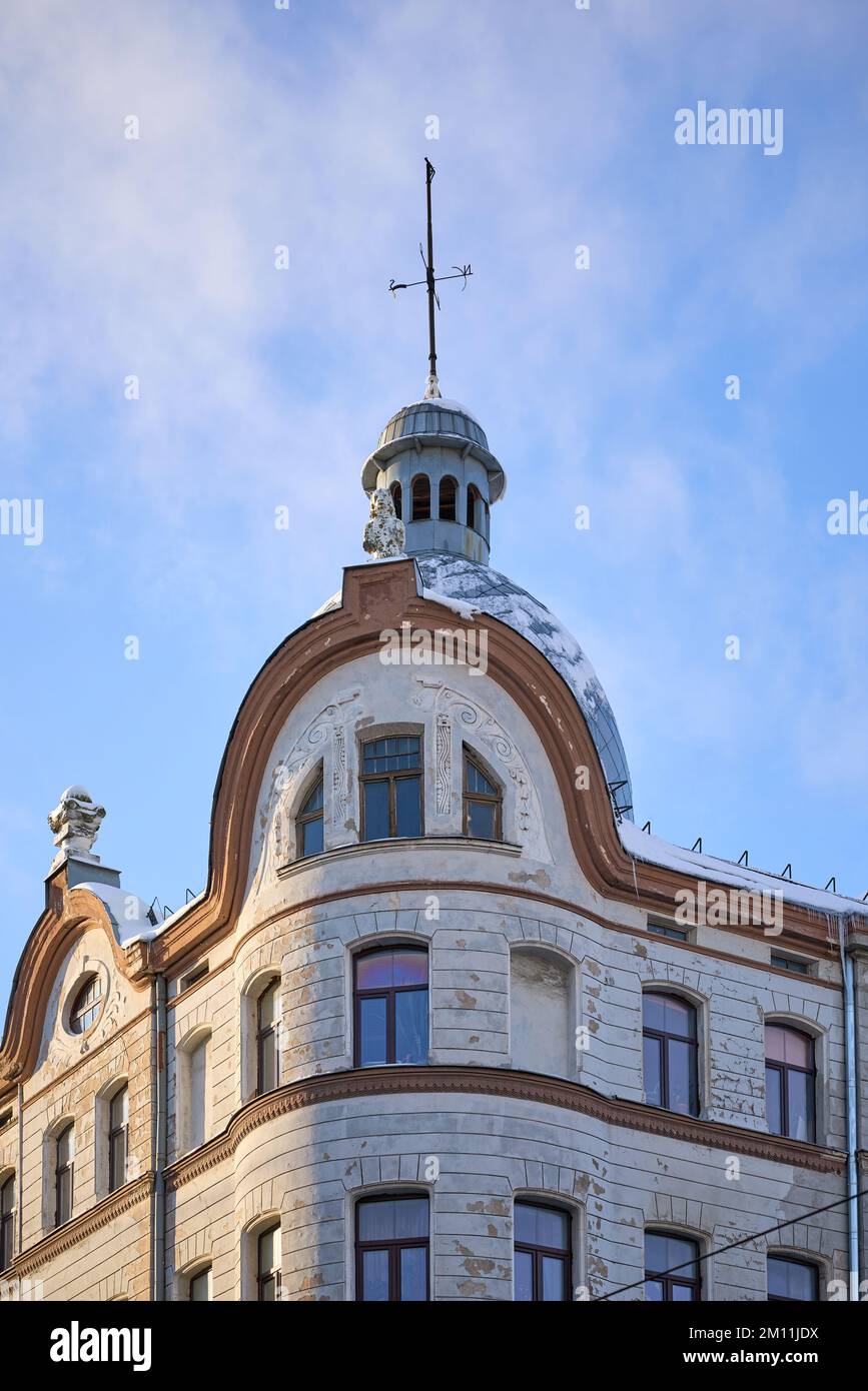 Riga, Latvia - 8 December, 2022: an old house facade with tower and ...