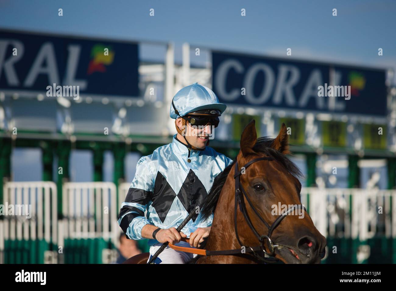 Jockey Kevin Stott waiting at the starting gates at York Races Stock ...