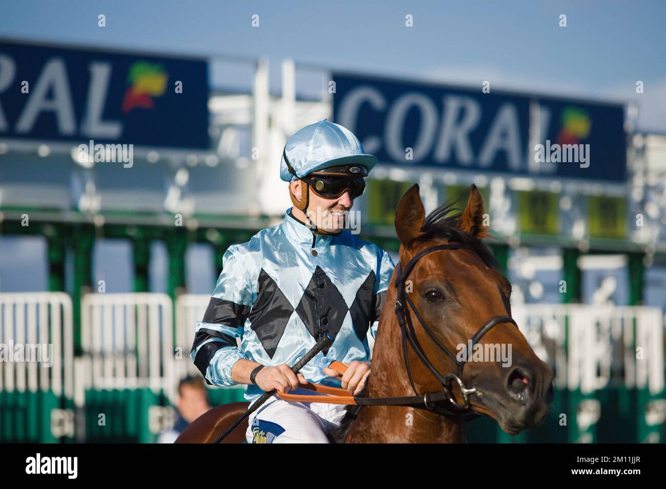 Jockey Kevin Stott waiting at the starting gates at York Races Stock ...