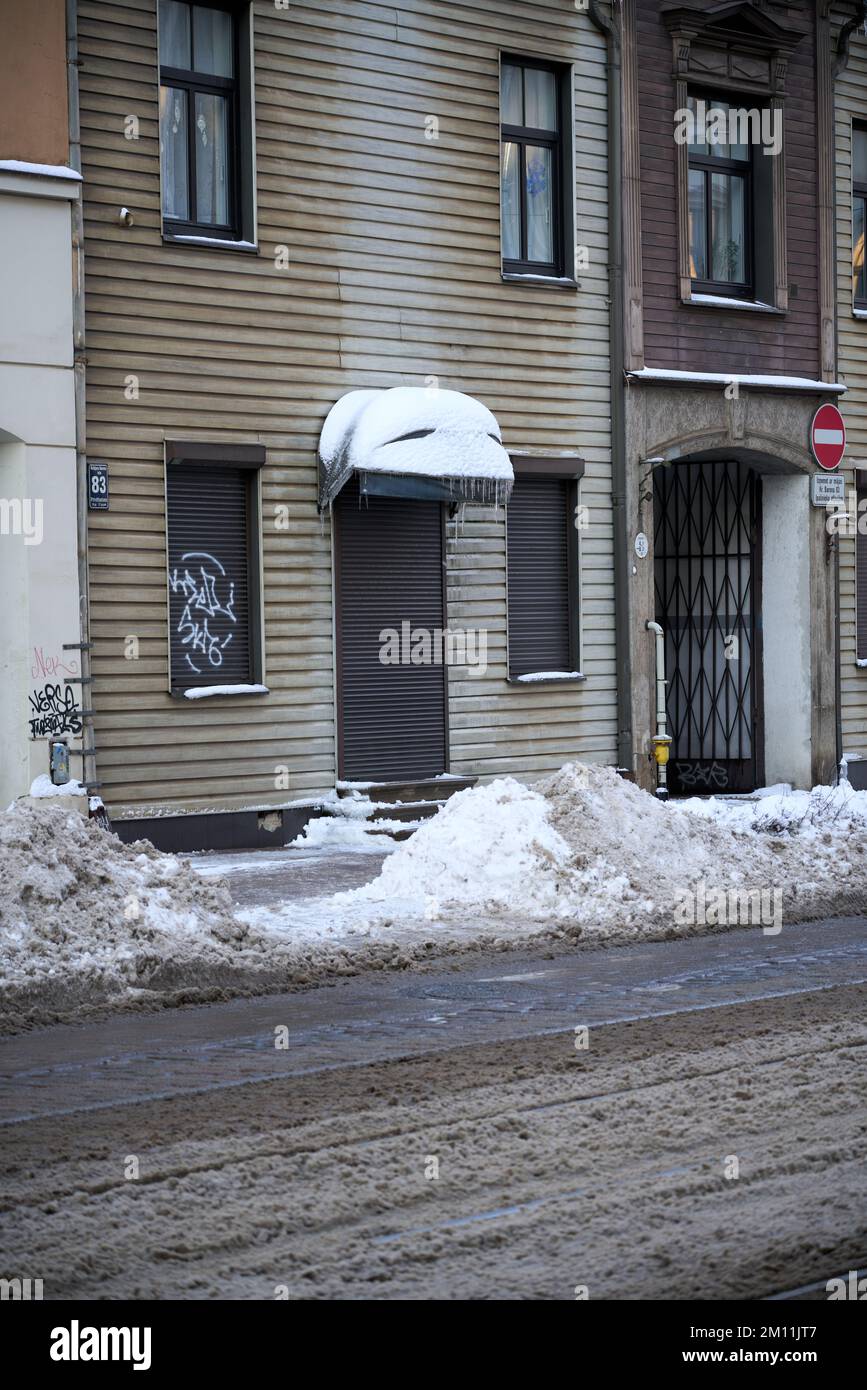 Riga, Latvia - 8 December, 2022: Closed by metal shutter door and ...