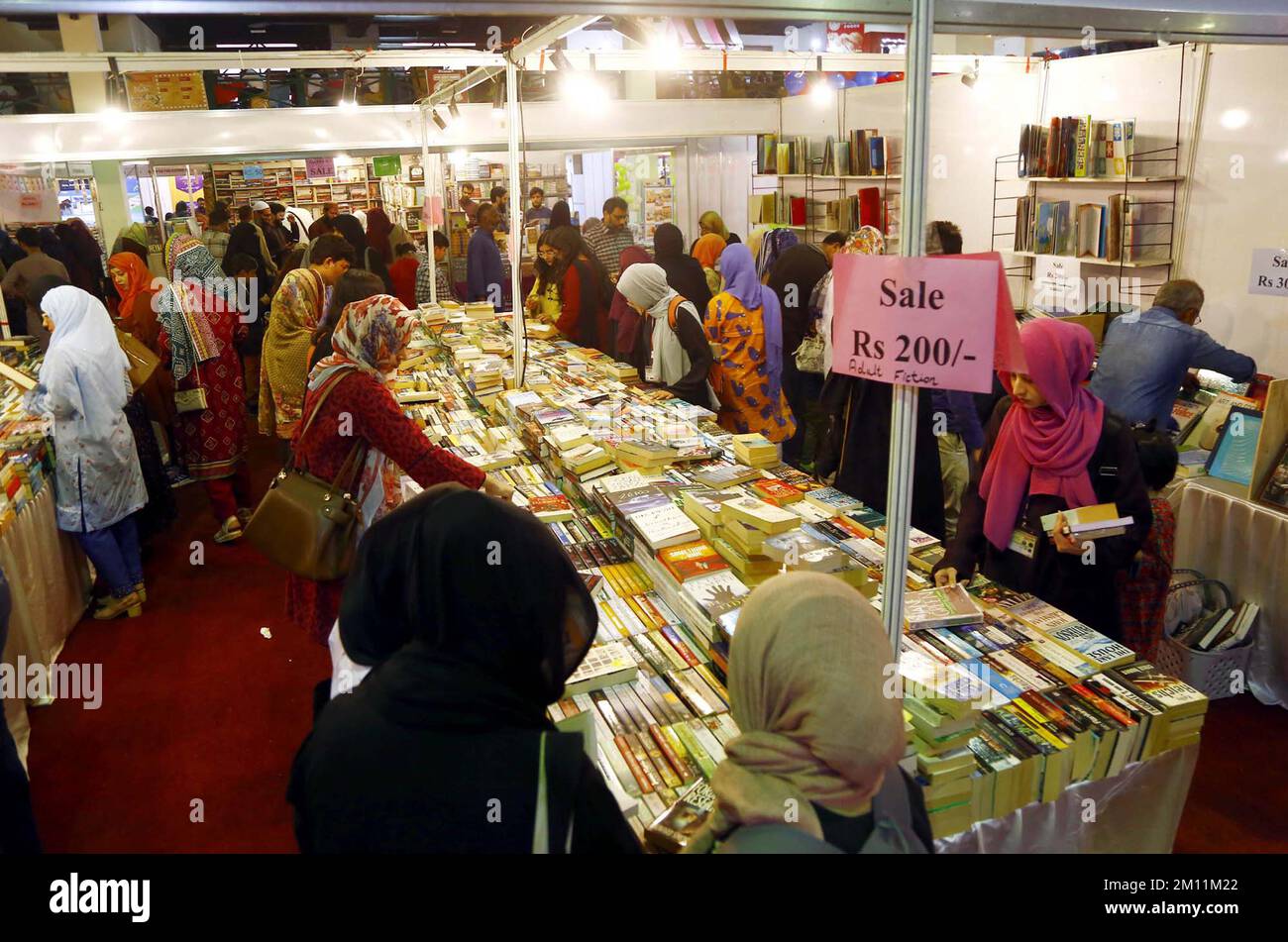 Visitors take keen interest in books during 17th Karachi International ...