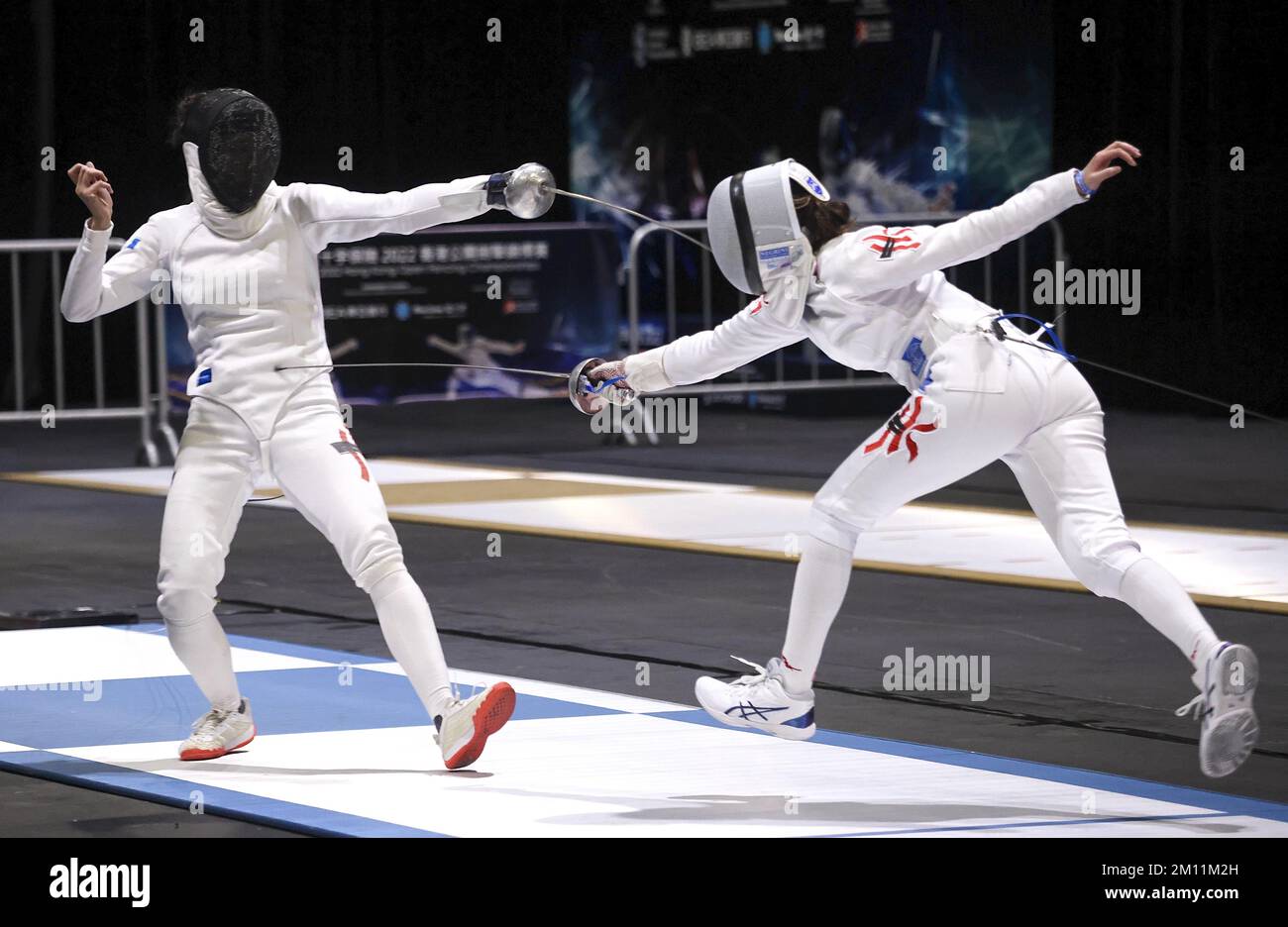 Women's Epee finals between Vivian Kong Man-wai (L) and Chan Wai-ling ...