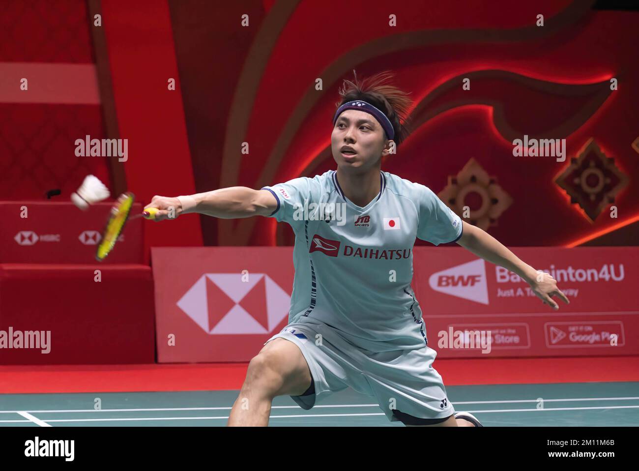 Kodai Naraoka of Japan seen in action during the Badminton Menís double ...