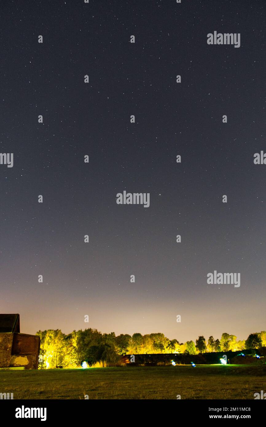 The nightscape of the sky with stars and a gradient from black to ...