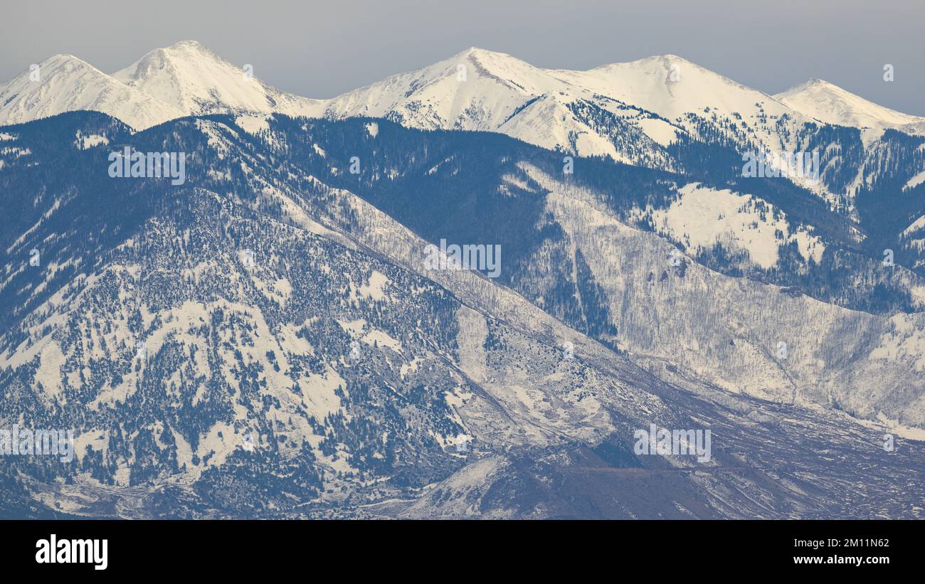 Snow capped La Sal Mountains from Arches National Park near Moab, Utah ...